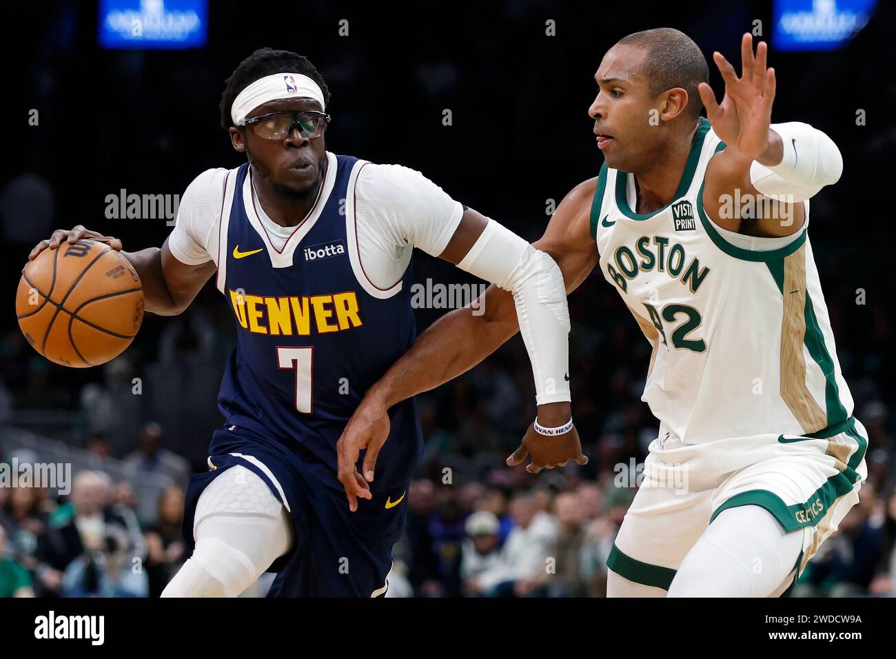 Denver Nuggets' Reggie Jackson (7) drives past Boston Celtics' Al ...