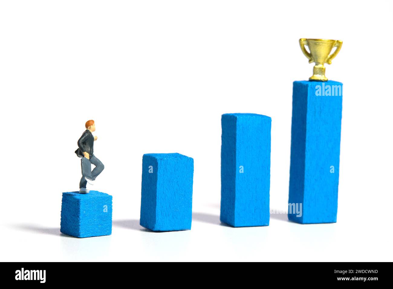 Miniature people toy figure photography. A boy pupil student running ...