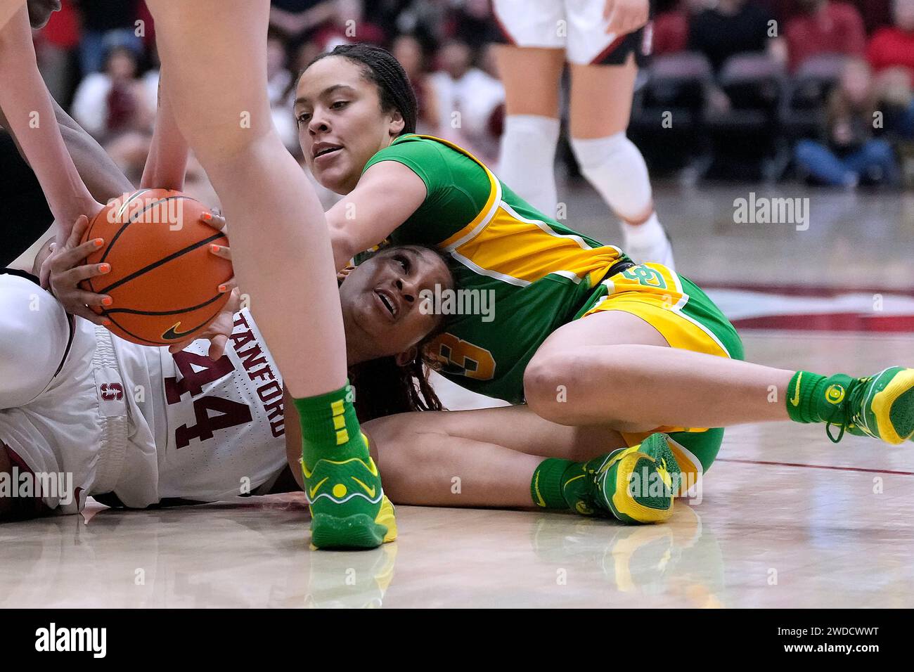 Stanford forward Kiki Iriafen (44) battles for the ball against Oregon ...
