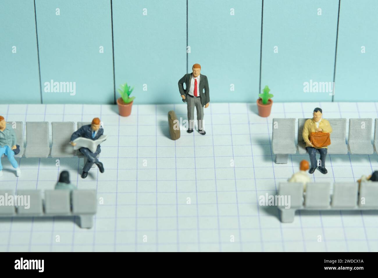 Miniature tiny people toy figure photography. Bored concept ...