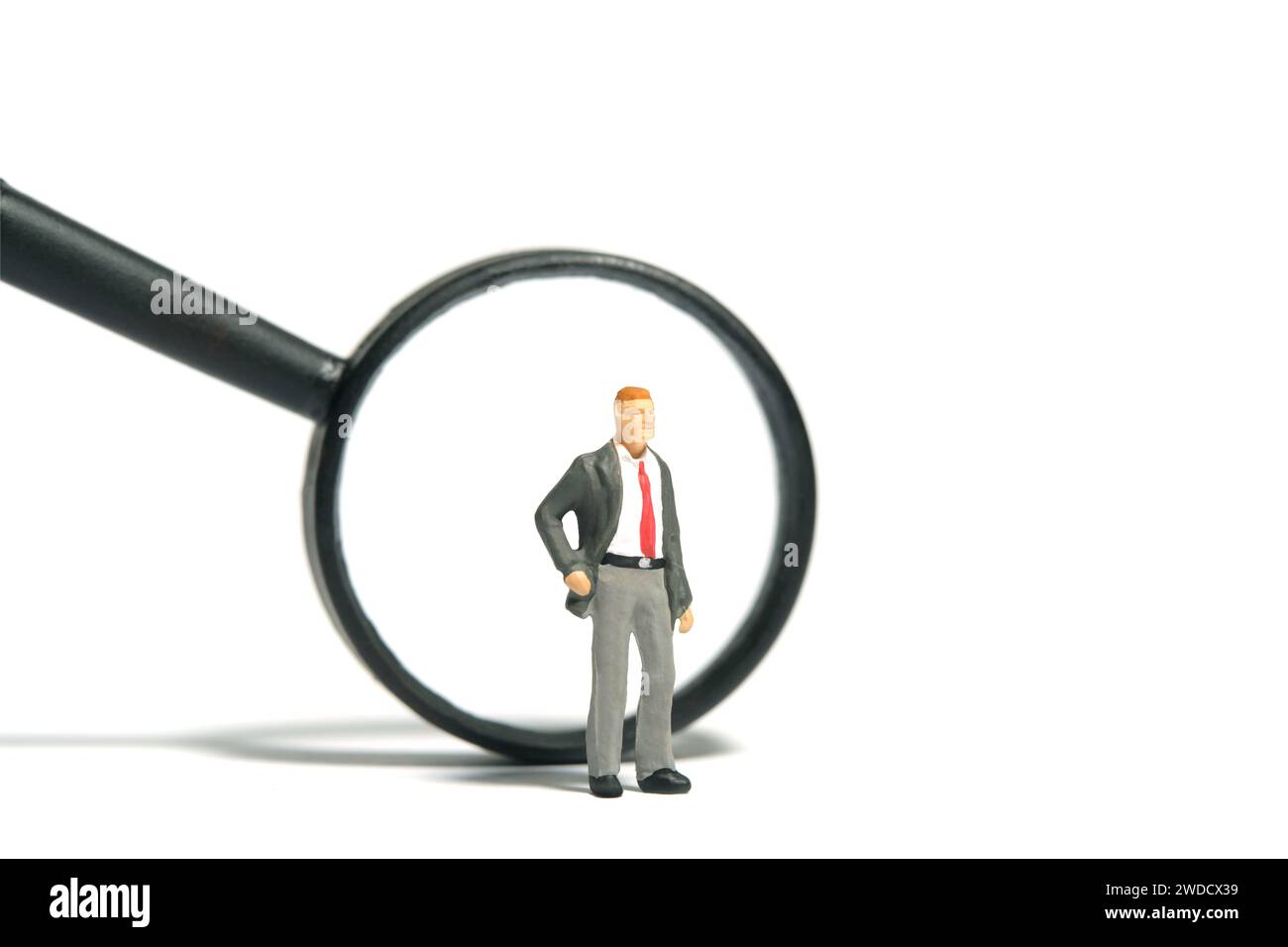 Miniature tiny people toy figure photography. A businessman standing in ...