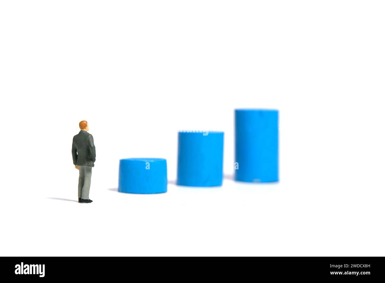 Miniature tiny people toy figure photography. Successful business ...