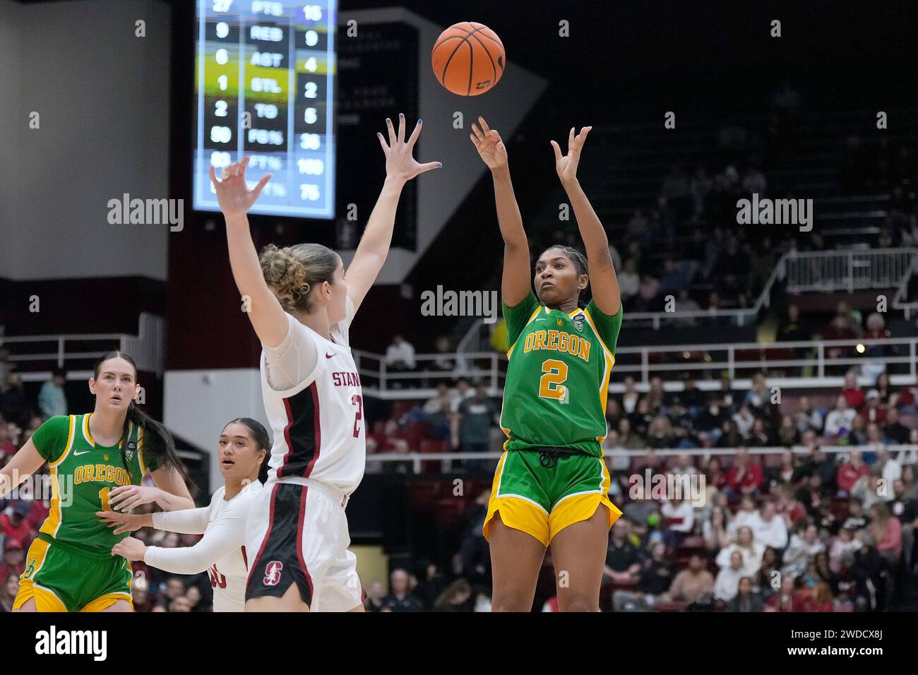 Oregon guard Chance Gray (2) shoots over Stanford forward Brooke Demetre (21) during the first ...
