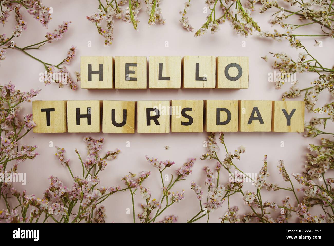 Hello Thursday alphabet letter on pink background Stock Photo - Alamy