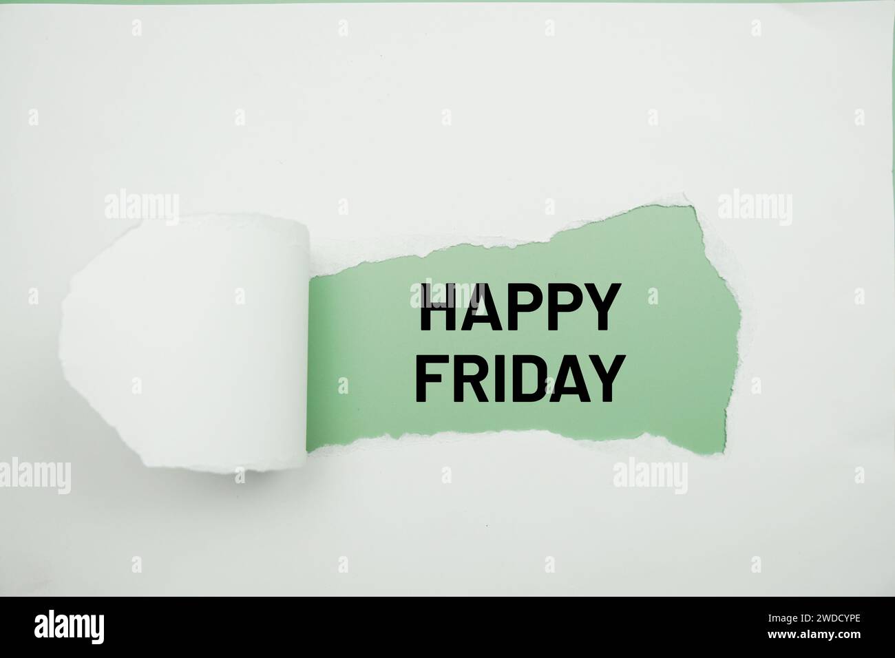 Happy Friday text message on green background Stock Photo - Alamy
