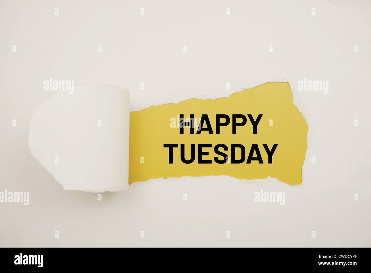 Happy Tuesday text message on yellow background Stock Photo - Alamy