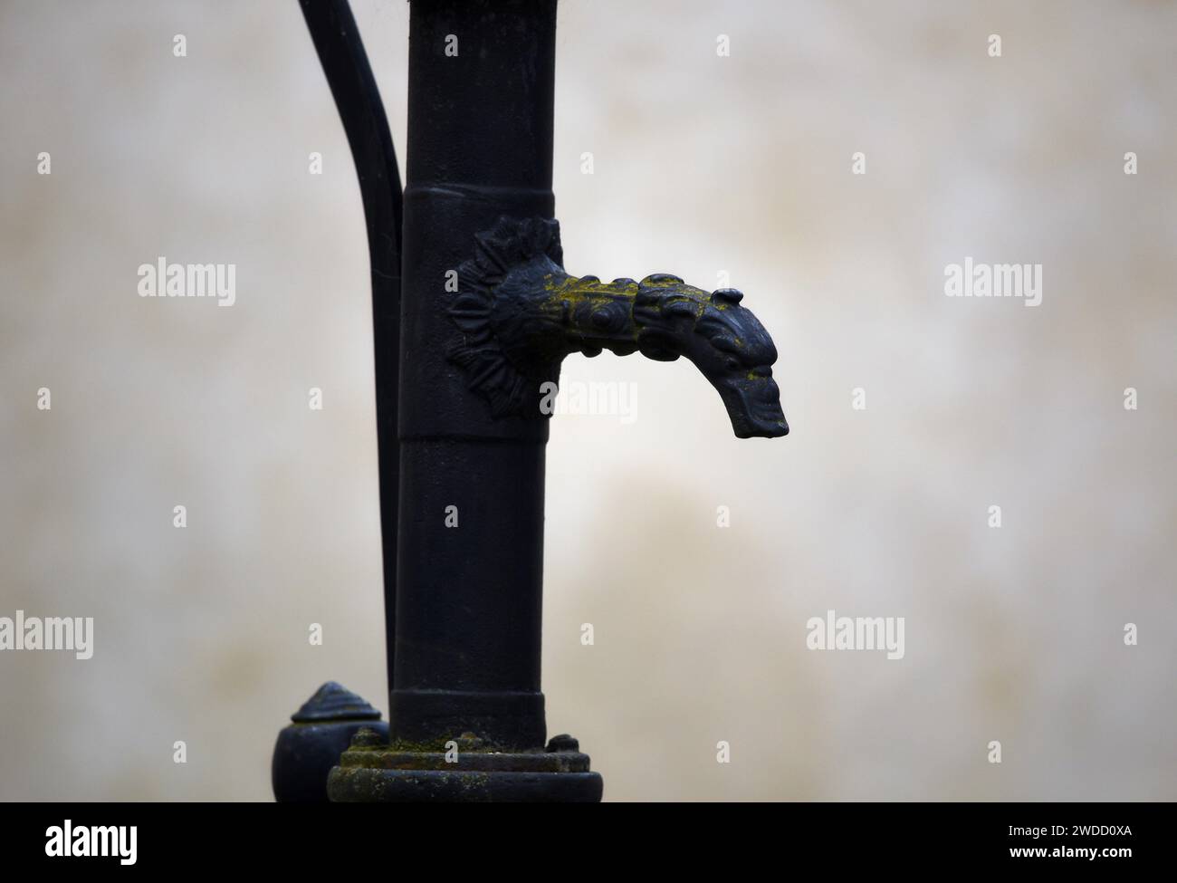 Vintage outdoor cast iron drinking water faucet in Barr Alsace, France ...