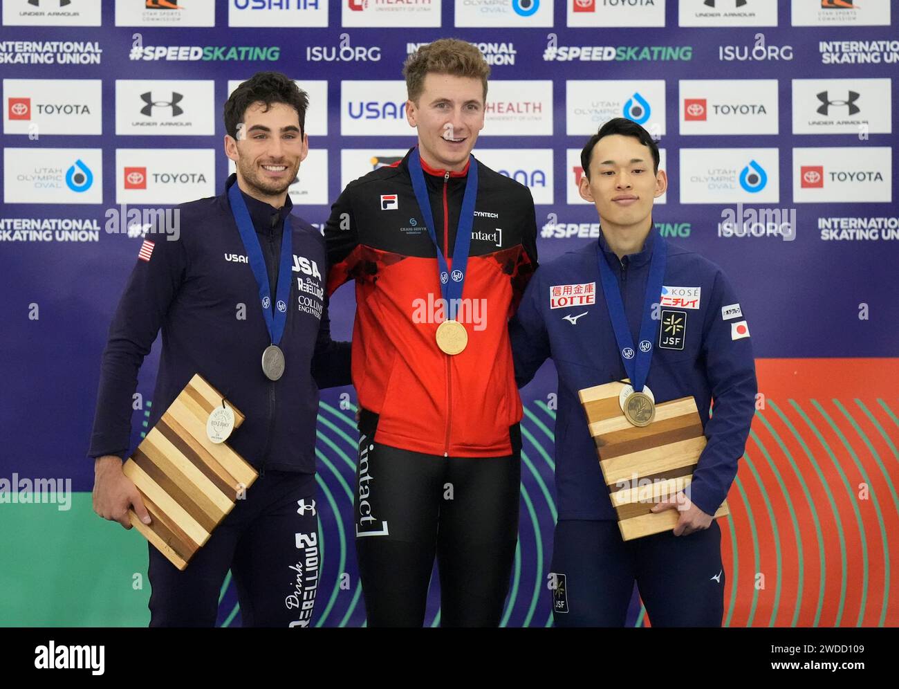 First-place Connor Howe, center, of Canada, celebrates with second ...