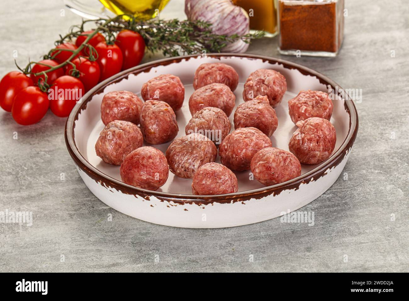 Uncooked raw beef meatball minced meat Stock Photo - Alamy