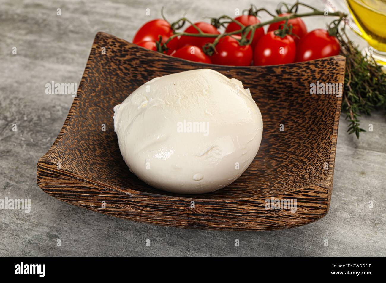 Round Mozzarella young cheese ball for salad Stock Photo - Alamy