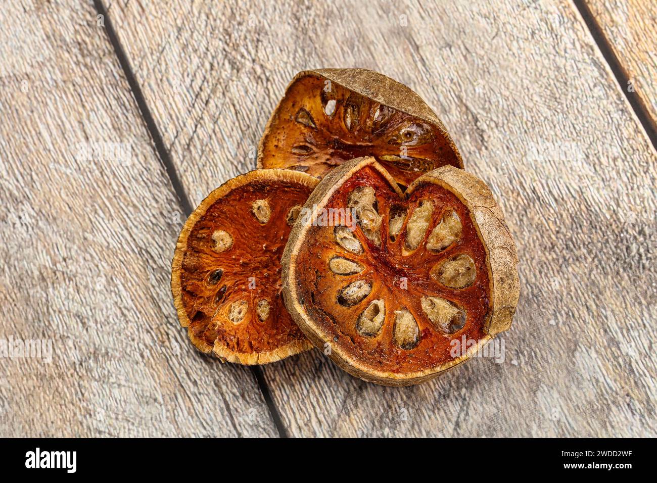 Thai cuisine - dry bael fruit for drinks Stock Photo - Alamy