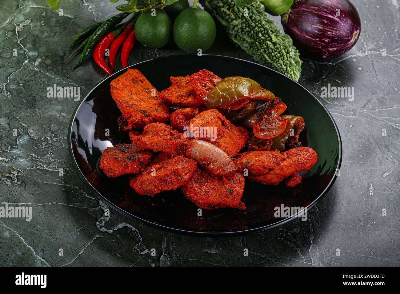 Indian cuisine - chicken red tikka barbecue Stock Photo - Alamy