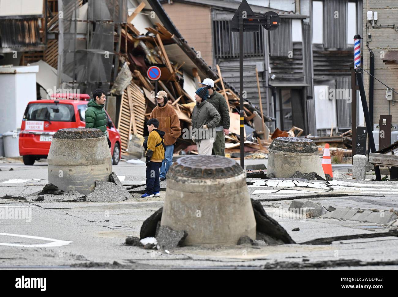 Manholes have risen due to soil liquefaction triggered by an earthquake ...