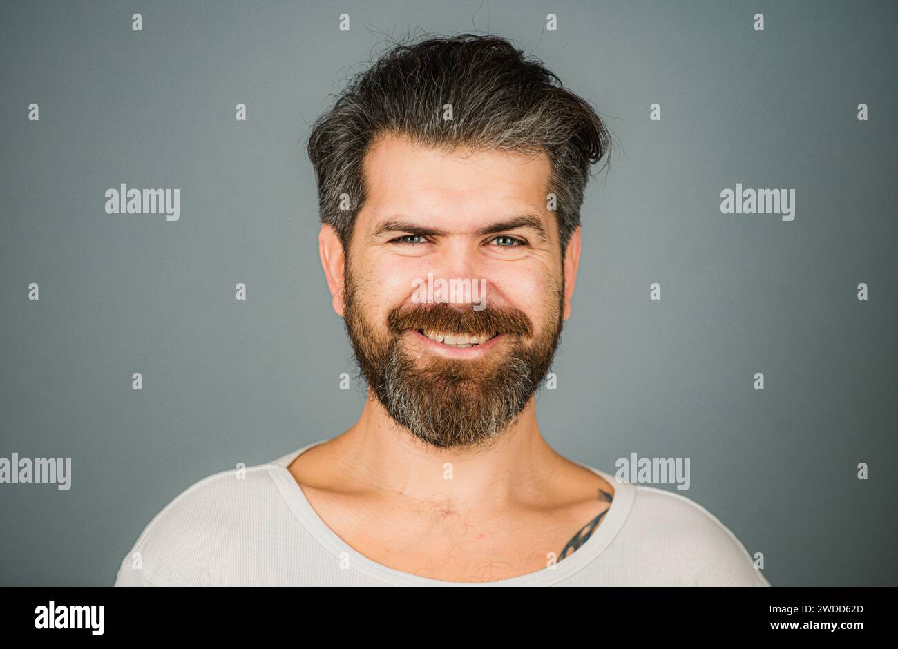 Bearded man smile face. Barbershop. Handsome smiling young guy. Human ...