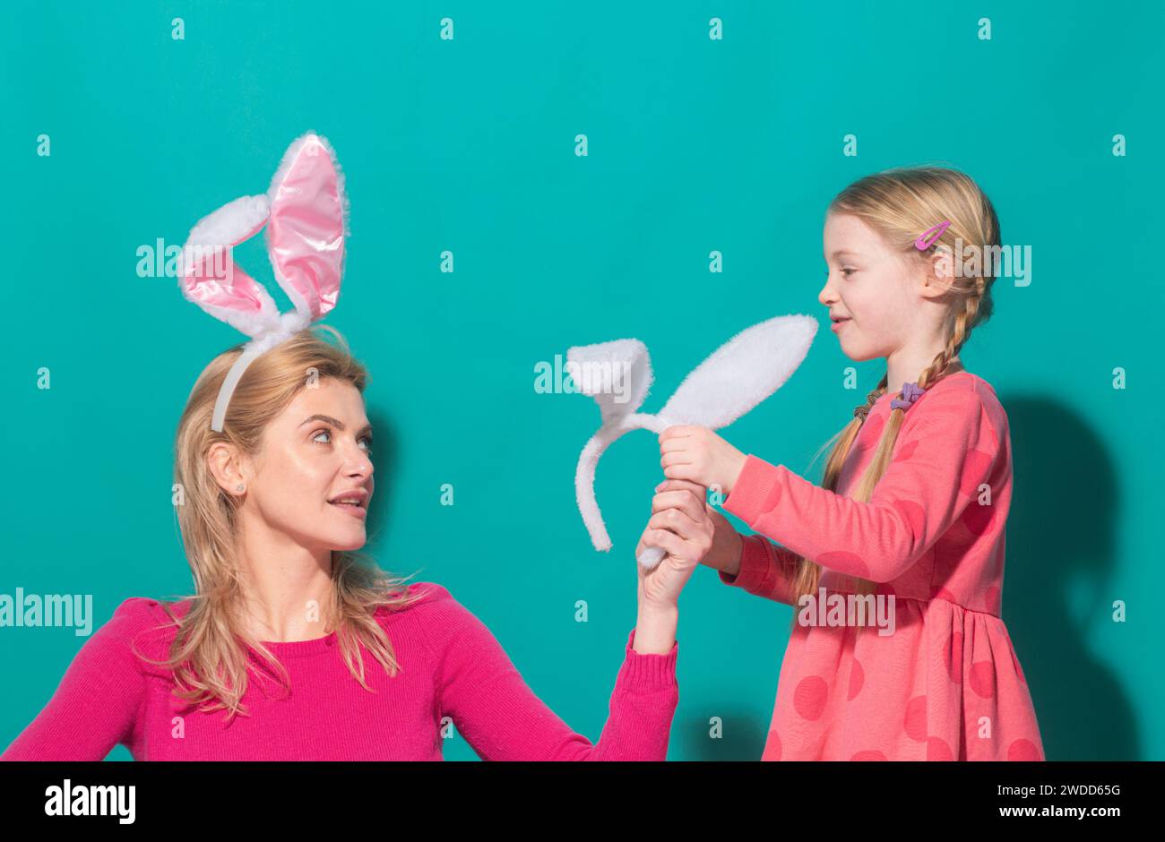 Happy Easter. Family mother and child daughter with bunny ears hare ...