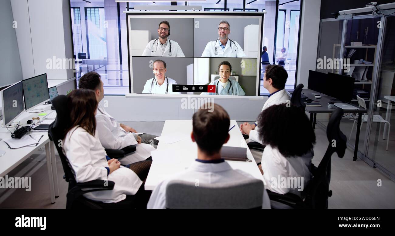Diverse doctors having video conference hi-res stock photography and ...