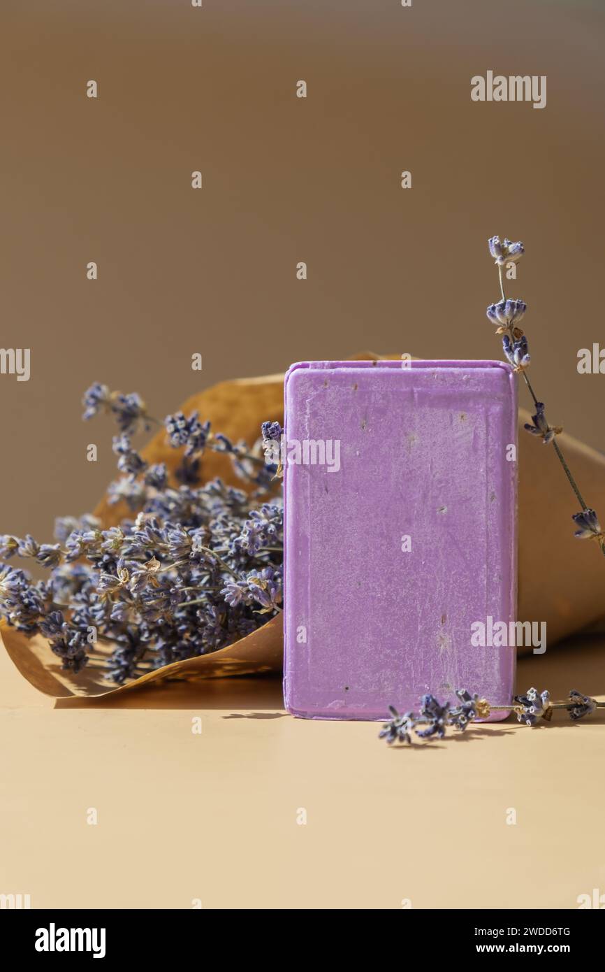 Lavender soap on beige background with copy space for your text. Advertisement template mock up ...