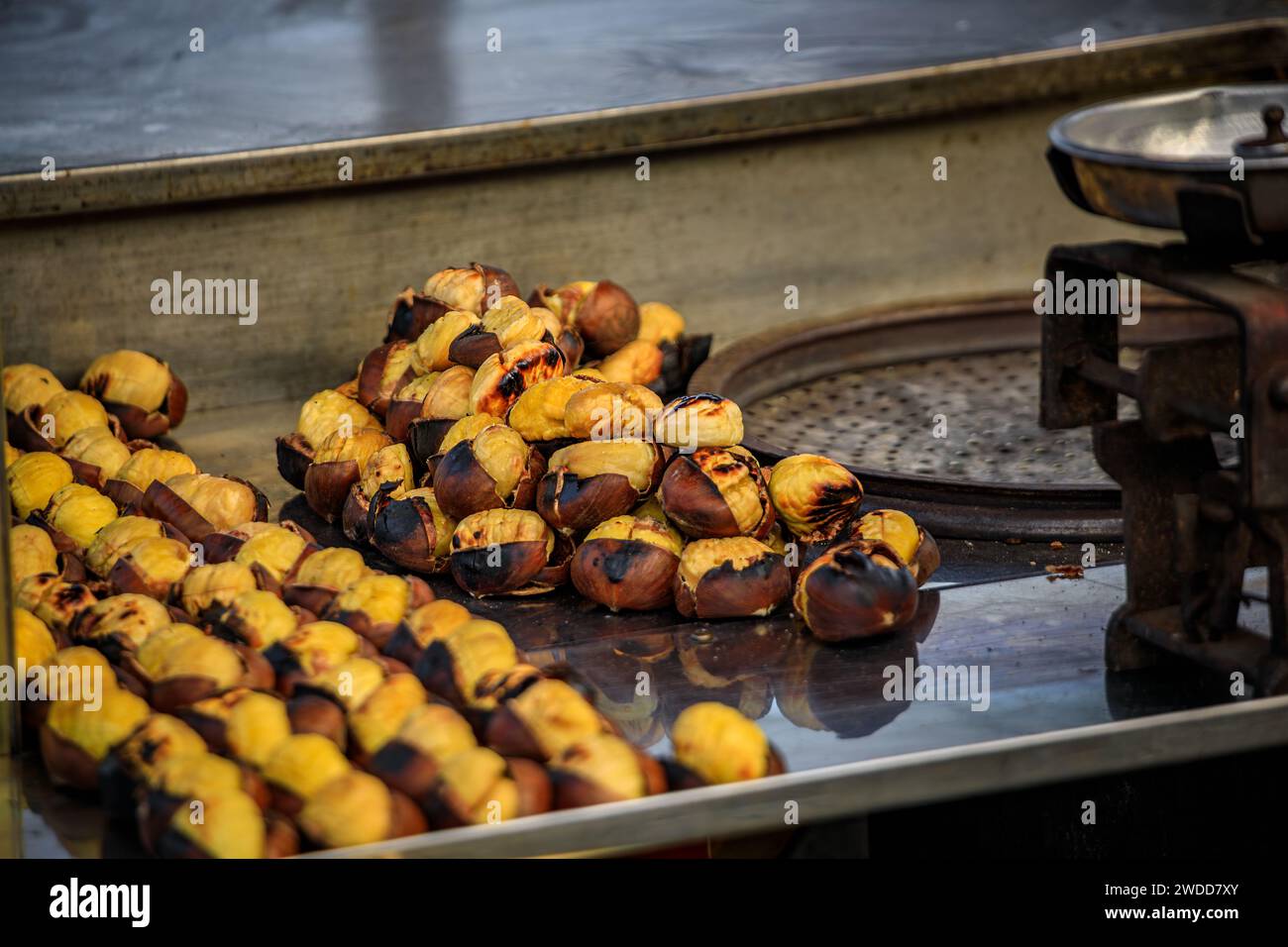 Mobile cart with traditional Turkish street food, hot fresh chestnuts ...
