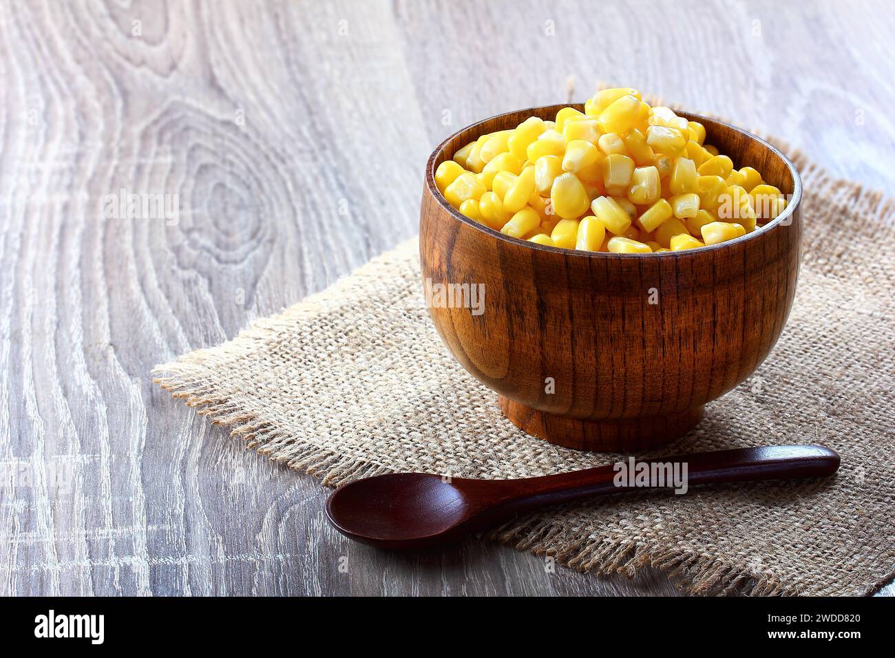 Bowl spoon corn yellow in hi-res stock photography and images - Alamy
