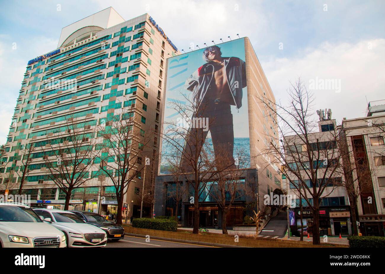 BTS V, Jan 19, 2024 : A large placard covering a building shows BTS V ...