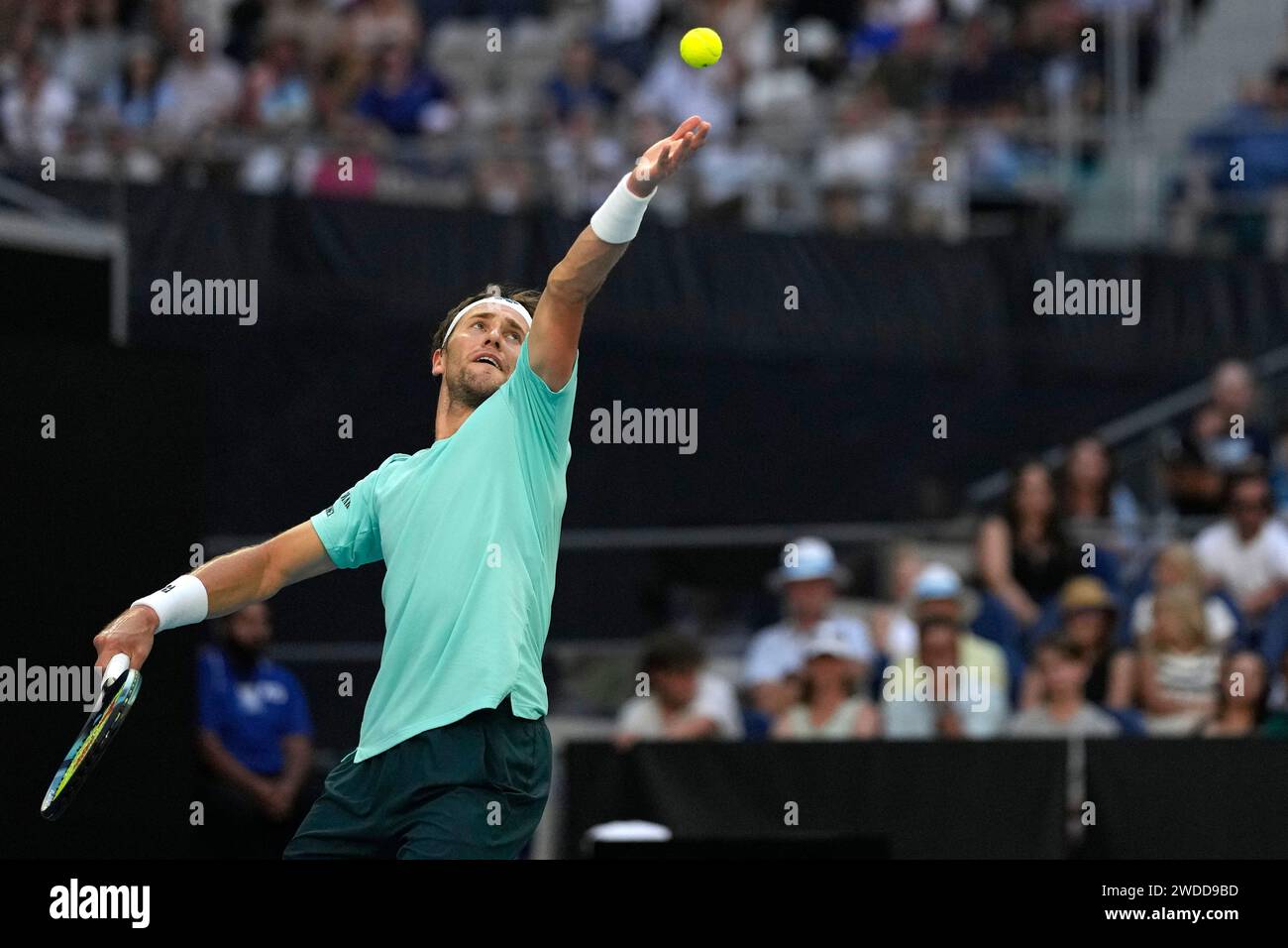 Casper Ruud of Norway serves to Cameron Norrie of Britain during their ...