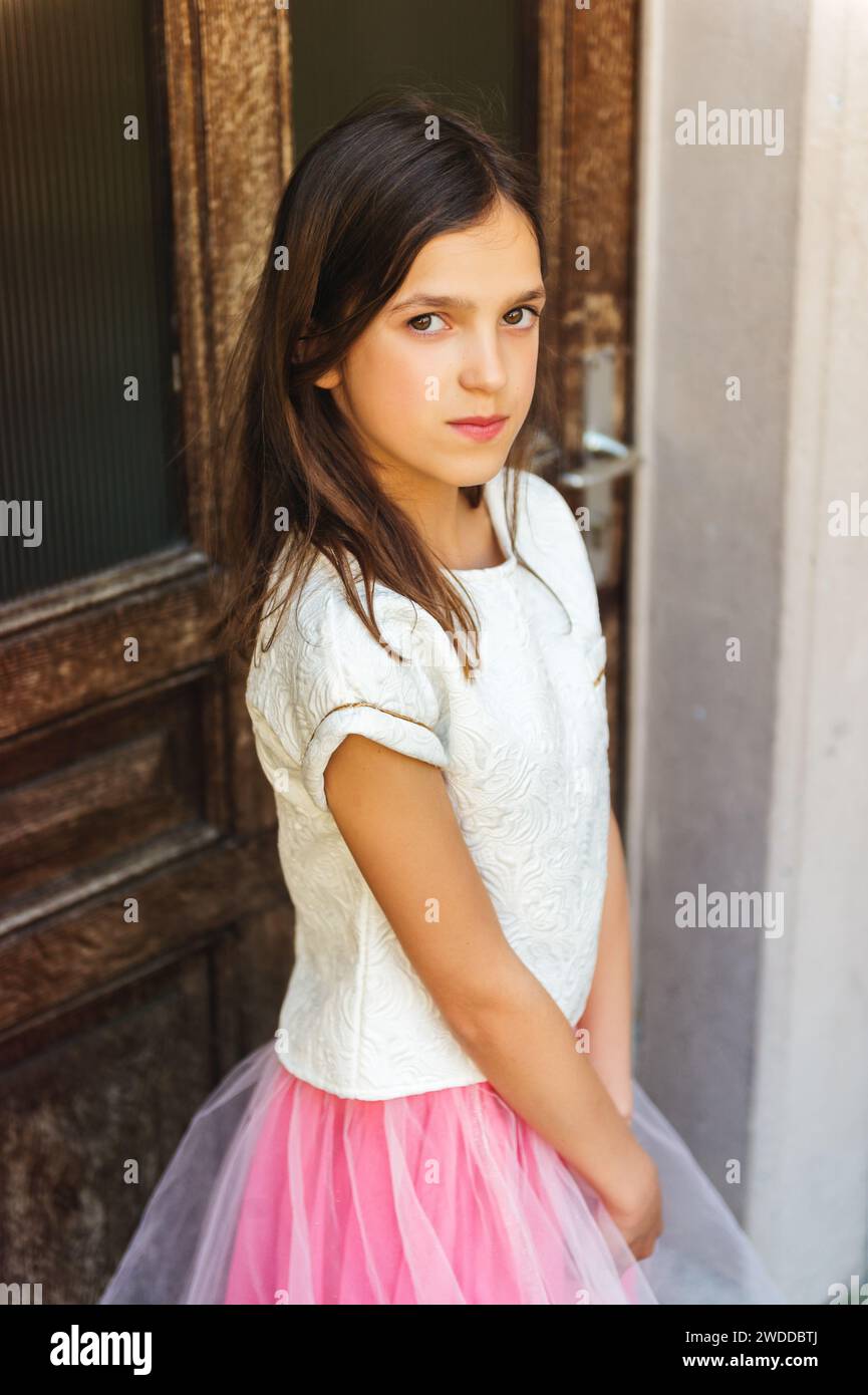 Preteen girl with teeth braces wearing beautiful dress Stock Photo - Alamy