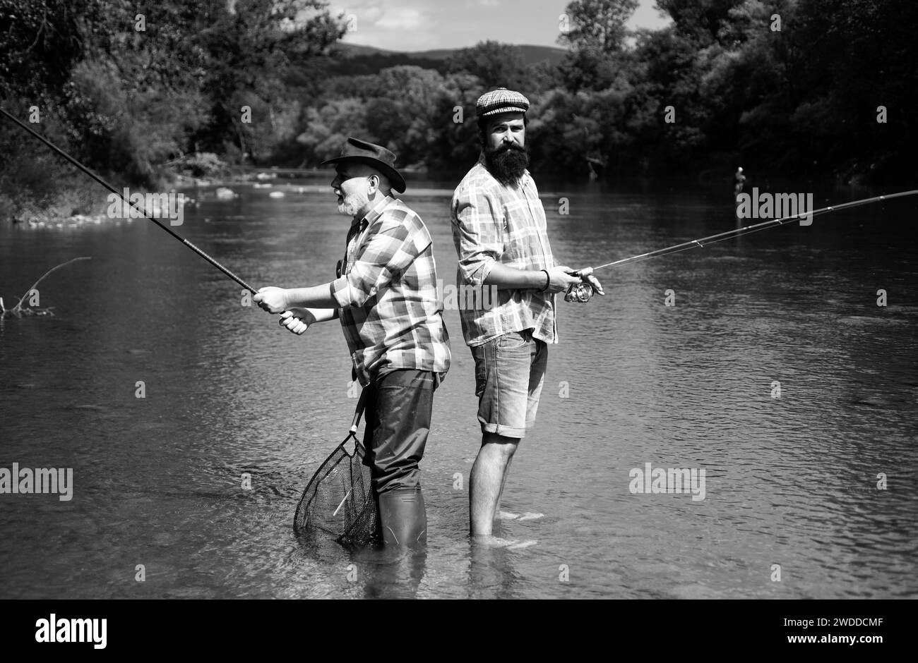 Man fisherman catches a fish. Sports fishing. It is not sport it is ...