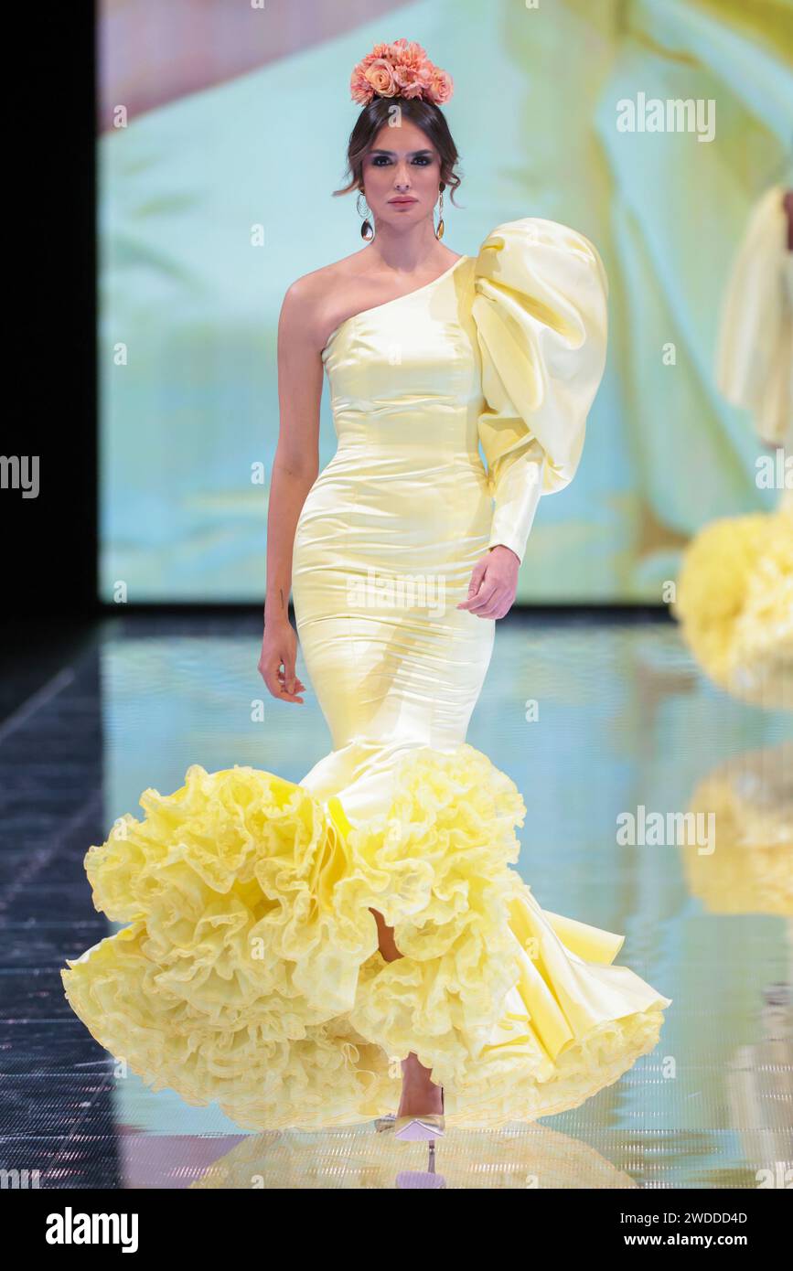 Seville, Spain. 18th Jan, 2024. A model is walking the runway at the ...