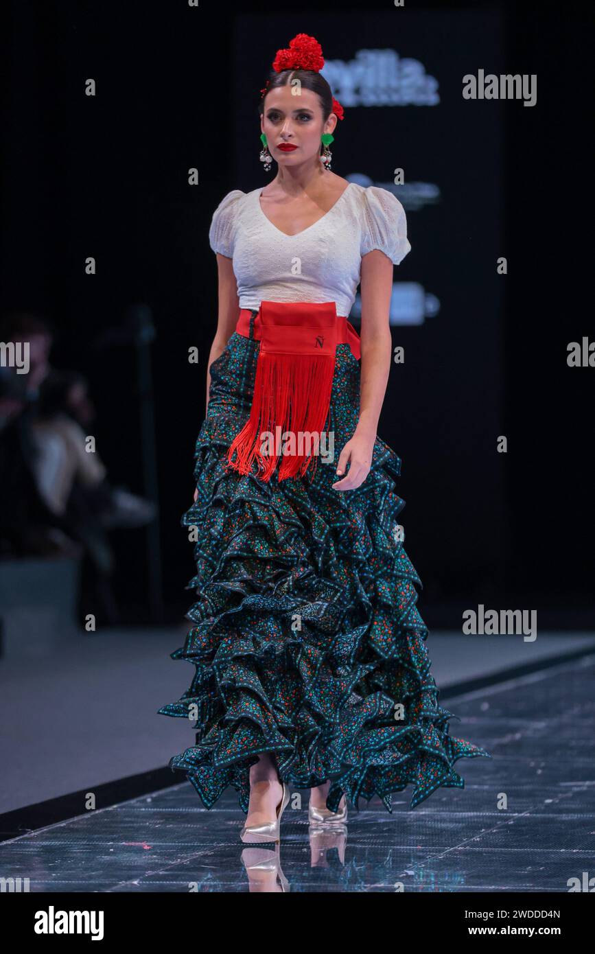 Seville, Spain. 18th Jan, 2024. A model is walking the runway at the ...
