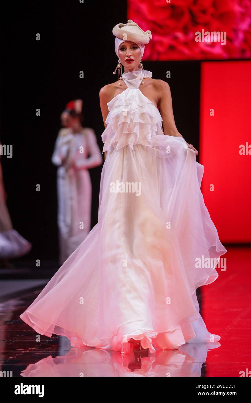 Seville, Spain. 18th Jan, 2024. A model is walking the runway at the ...