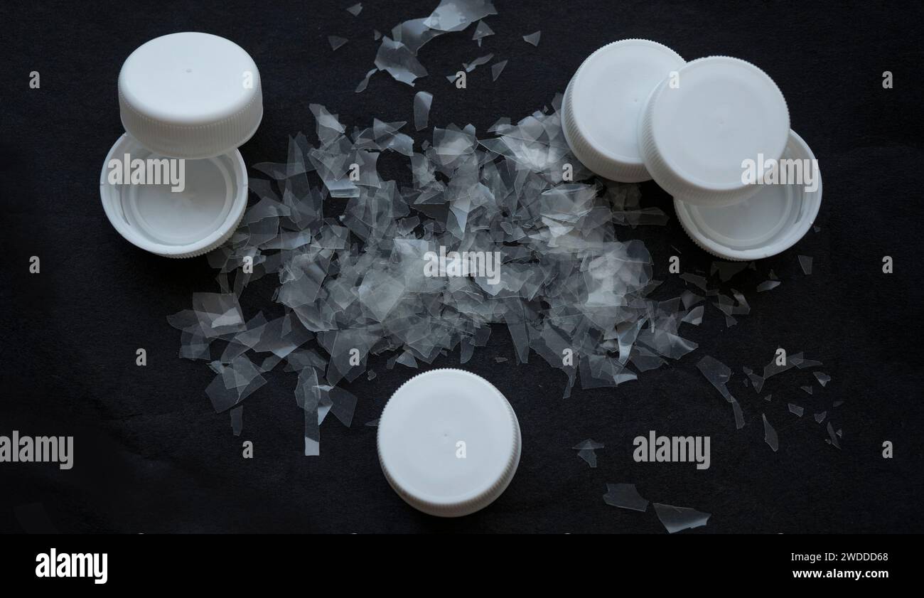 Macro shot on a pile of disintegrated micro plastic particles next to ...