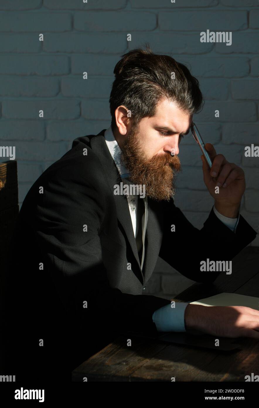 Thinking man. Portrait of a teacher or professor at classroom ...