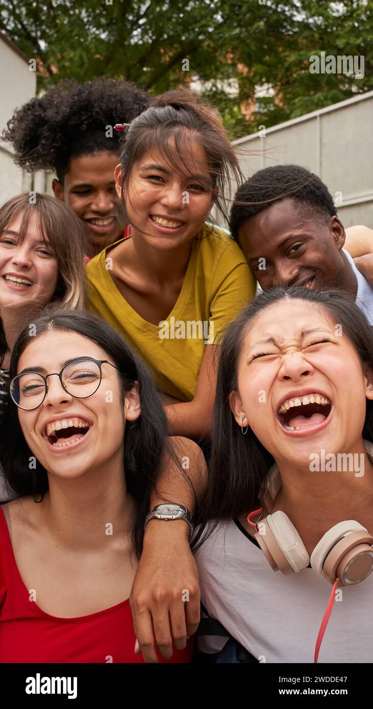 Vertical selfie young group excited students looking at camera laughing ...