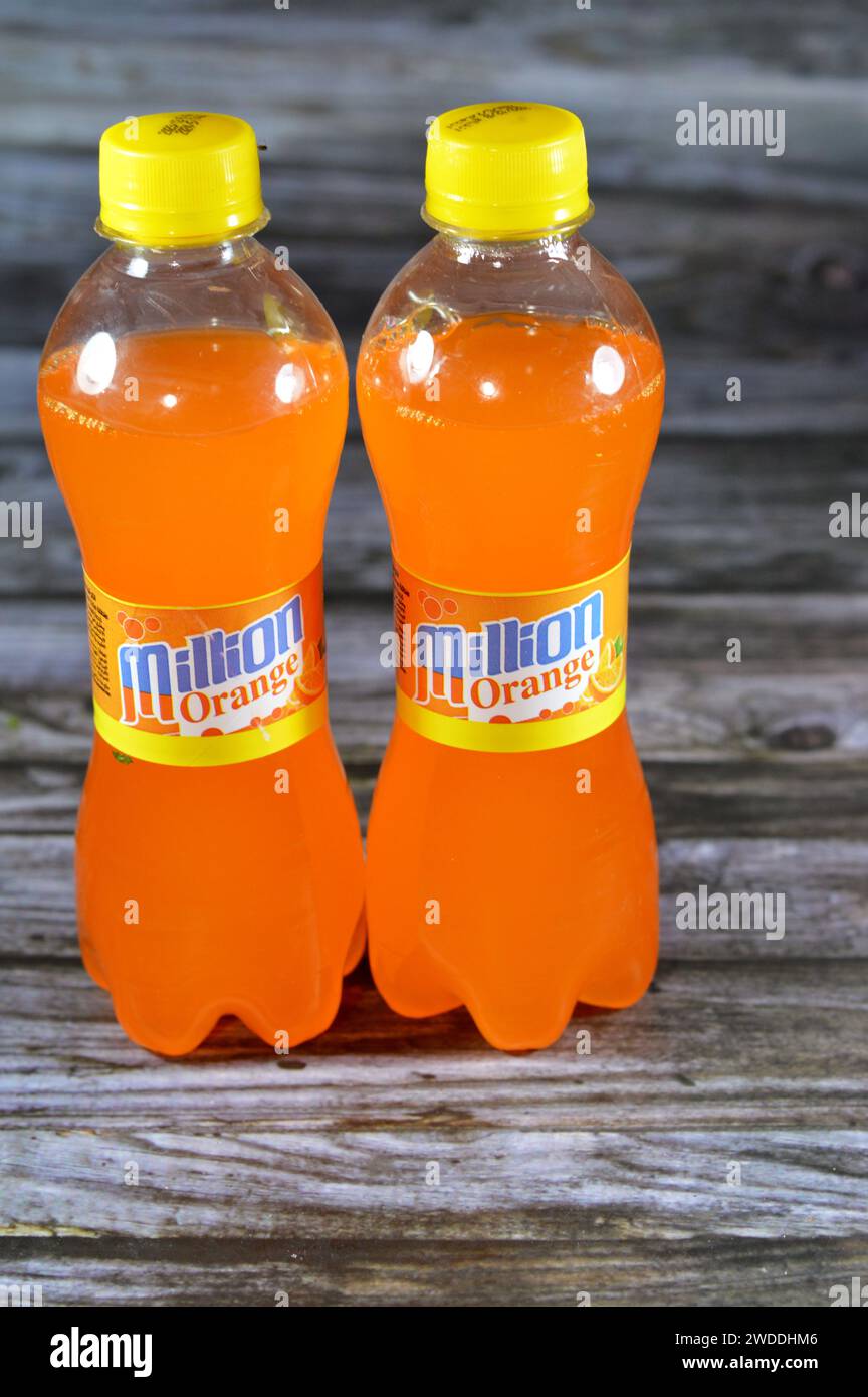 Cairo, Egypt, January 19 2024: Million Orange soft drink, orange pop soda, orangeade, carbonated ...