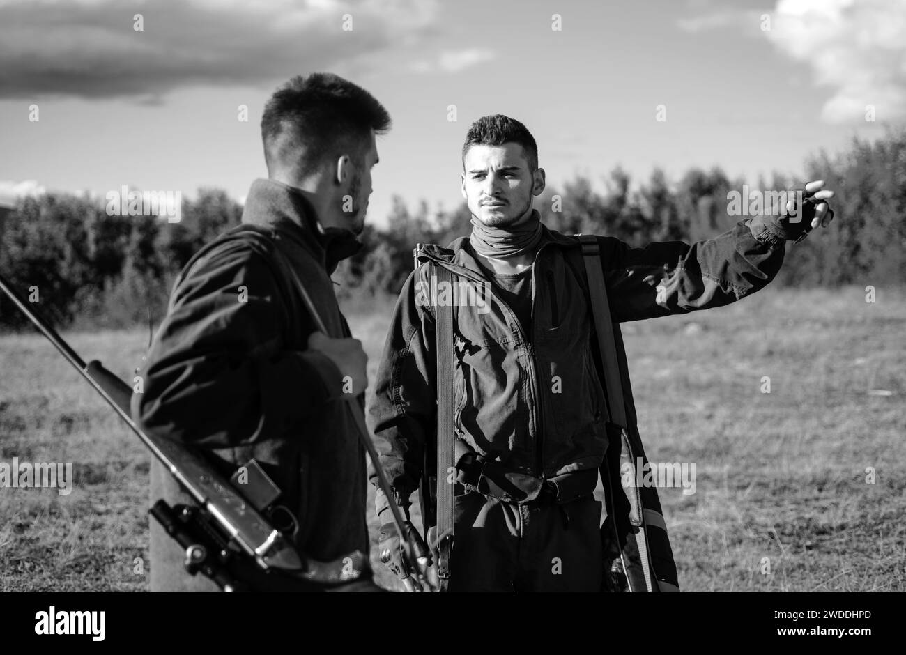 Hunter with shotgun gun on hunt. Hunting in spring forest Stock Photo ...