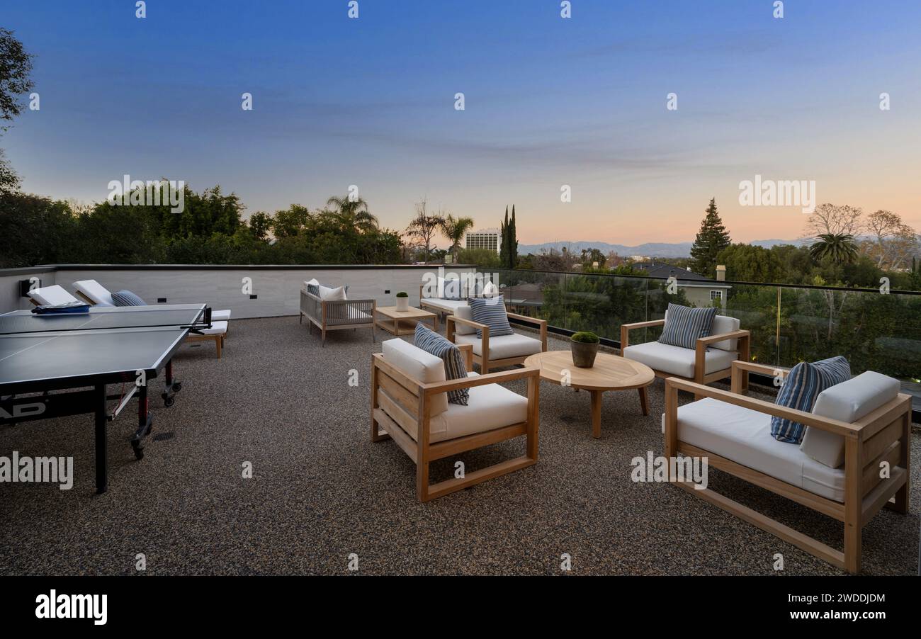 Outdoor table tennis set on rooftop near balcony, New Construction Home ...