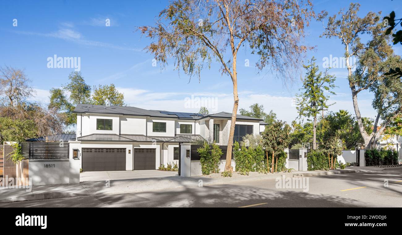 Beautiful house with a sprawling tree and a spacious driveway, New ...