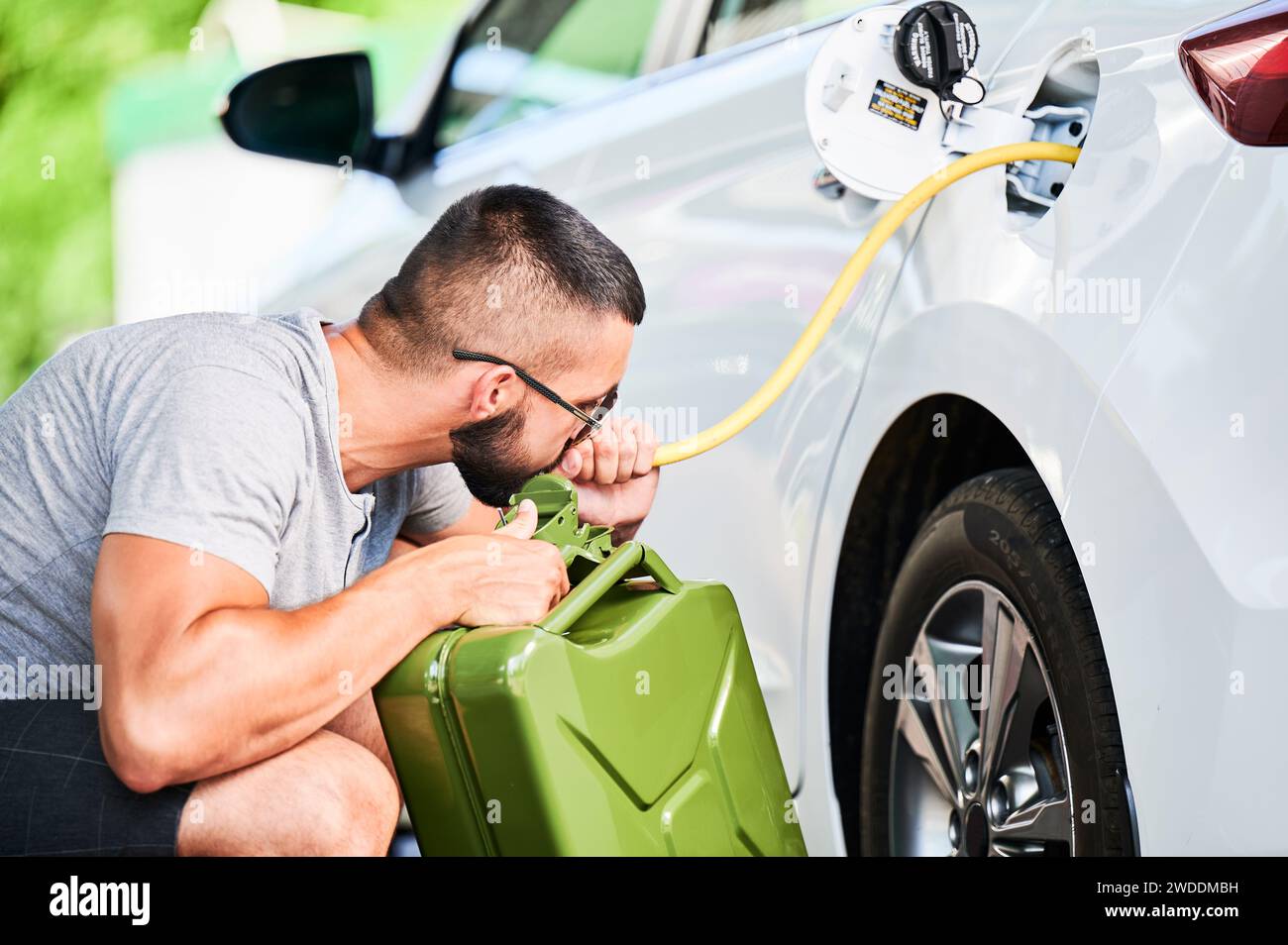 Stealing fuel hi-res stock photography and images - Alamy