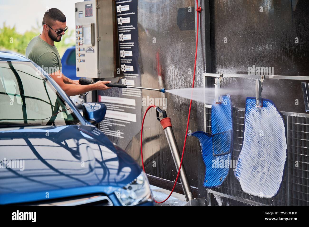 Cleaning blue car from foam hi-res stock photography and images - Alamy