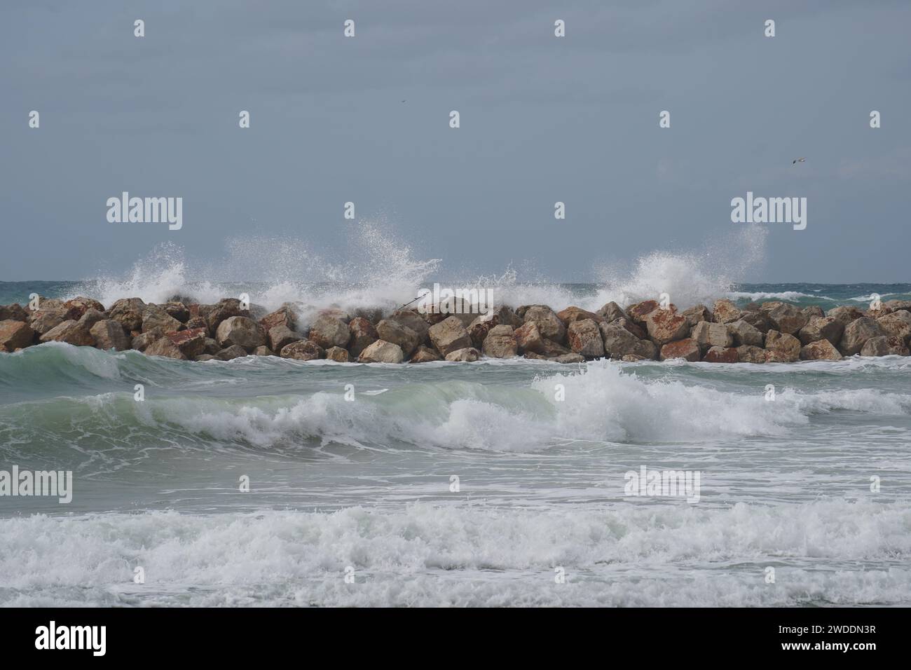 Strong currents and waves in the sea. Waves successfully crash into the ...