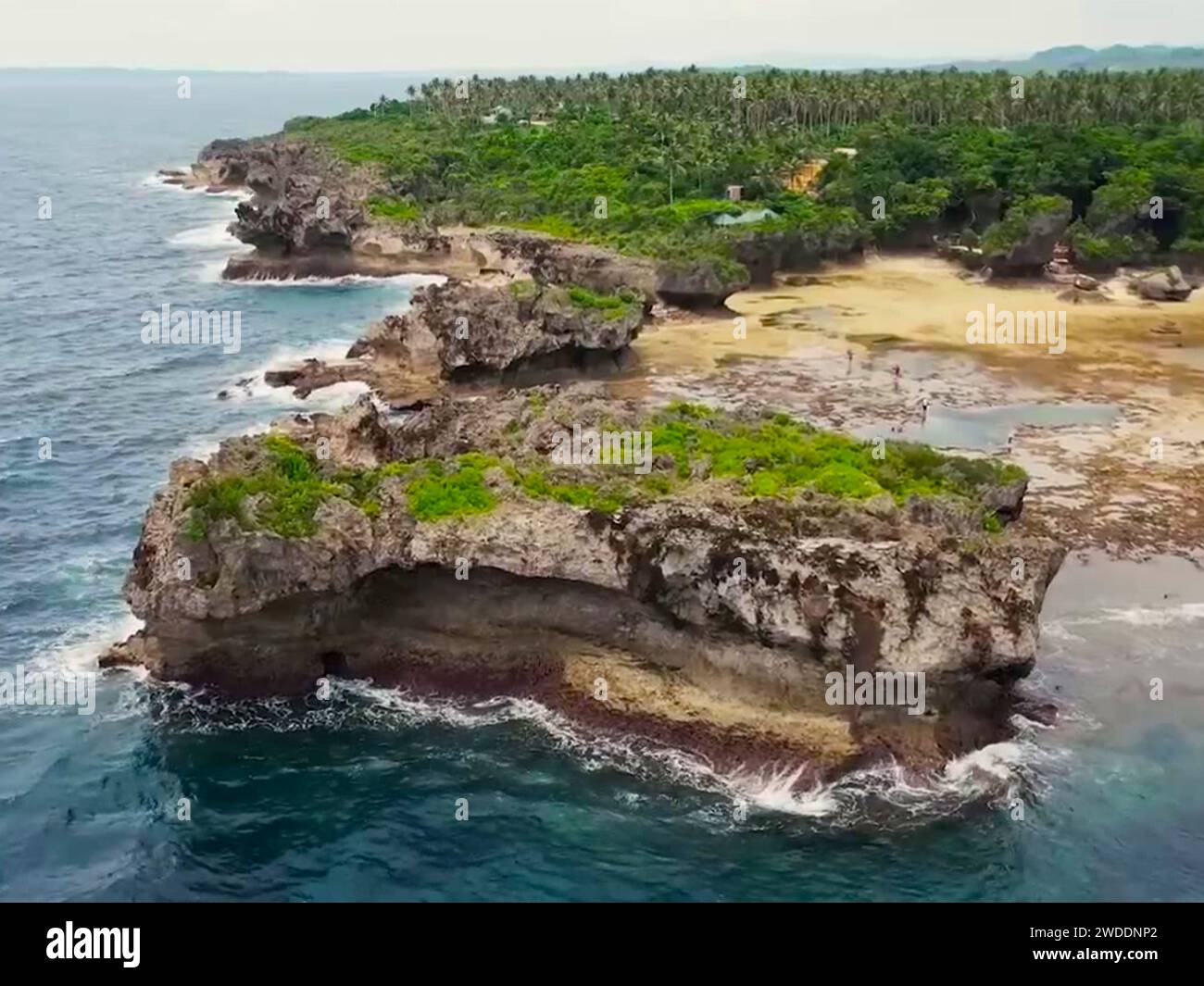 This captivating image showcases a picturesque coastline with a vast ...