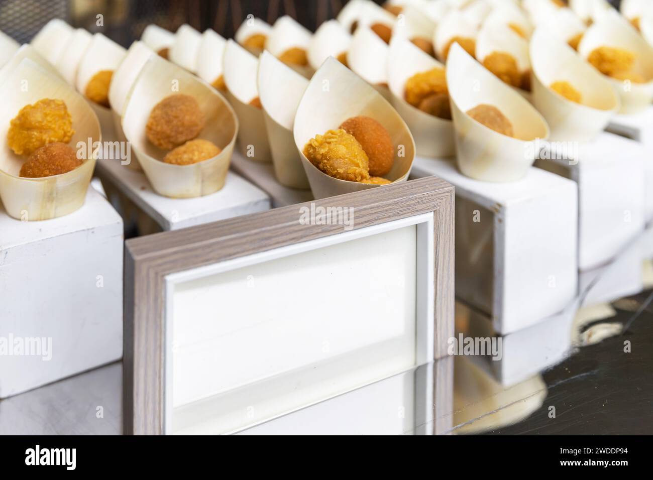 Fried Appetizers in paper cones for a party. Various tastes Stock Photo ...