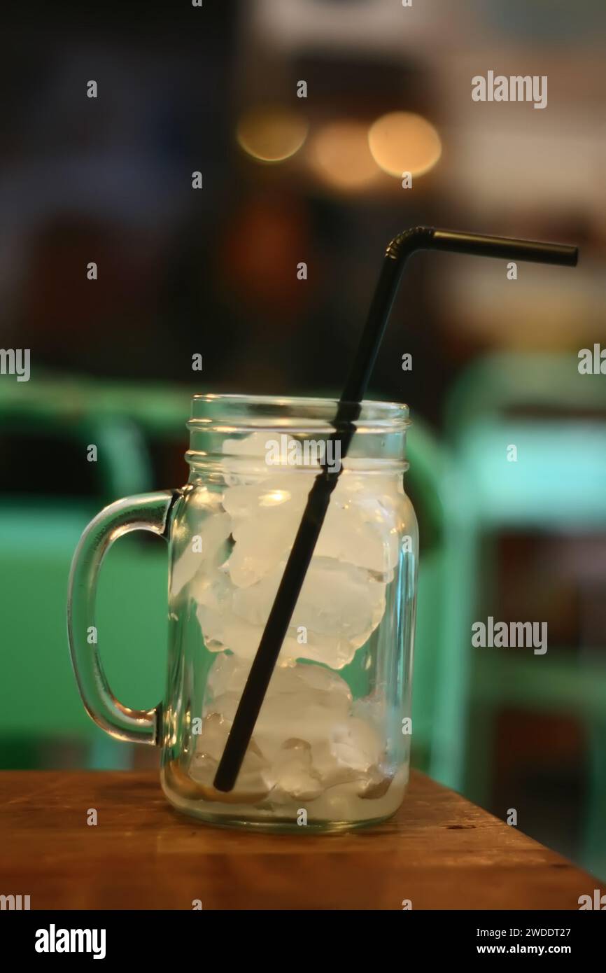 ice tube inside of transparent drinking glass Stock Photo - Alamy