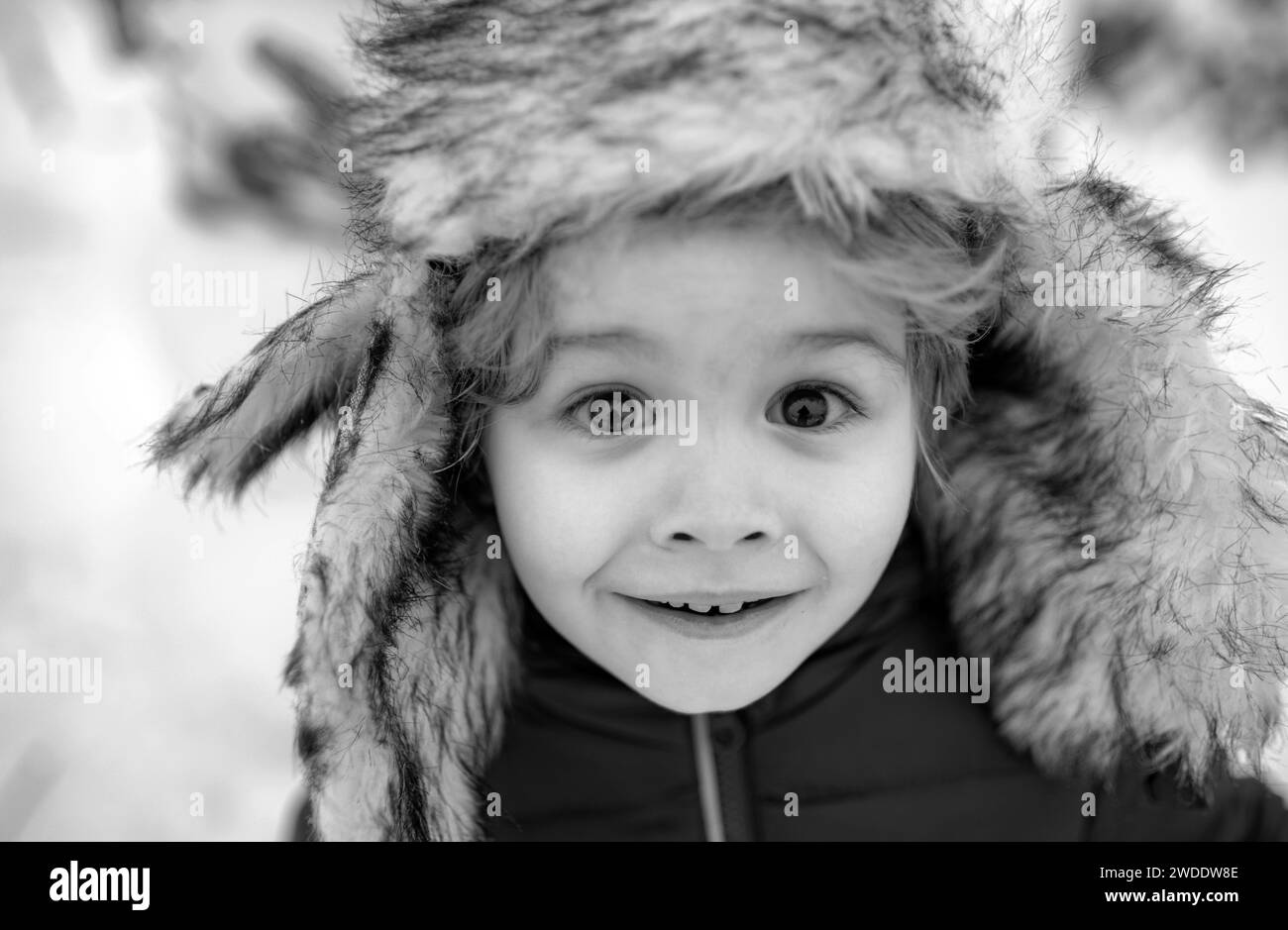 Winter kid excited face close up. Happy winter time. Happy child ...