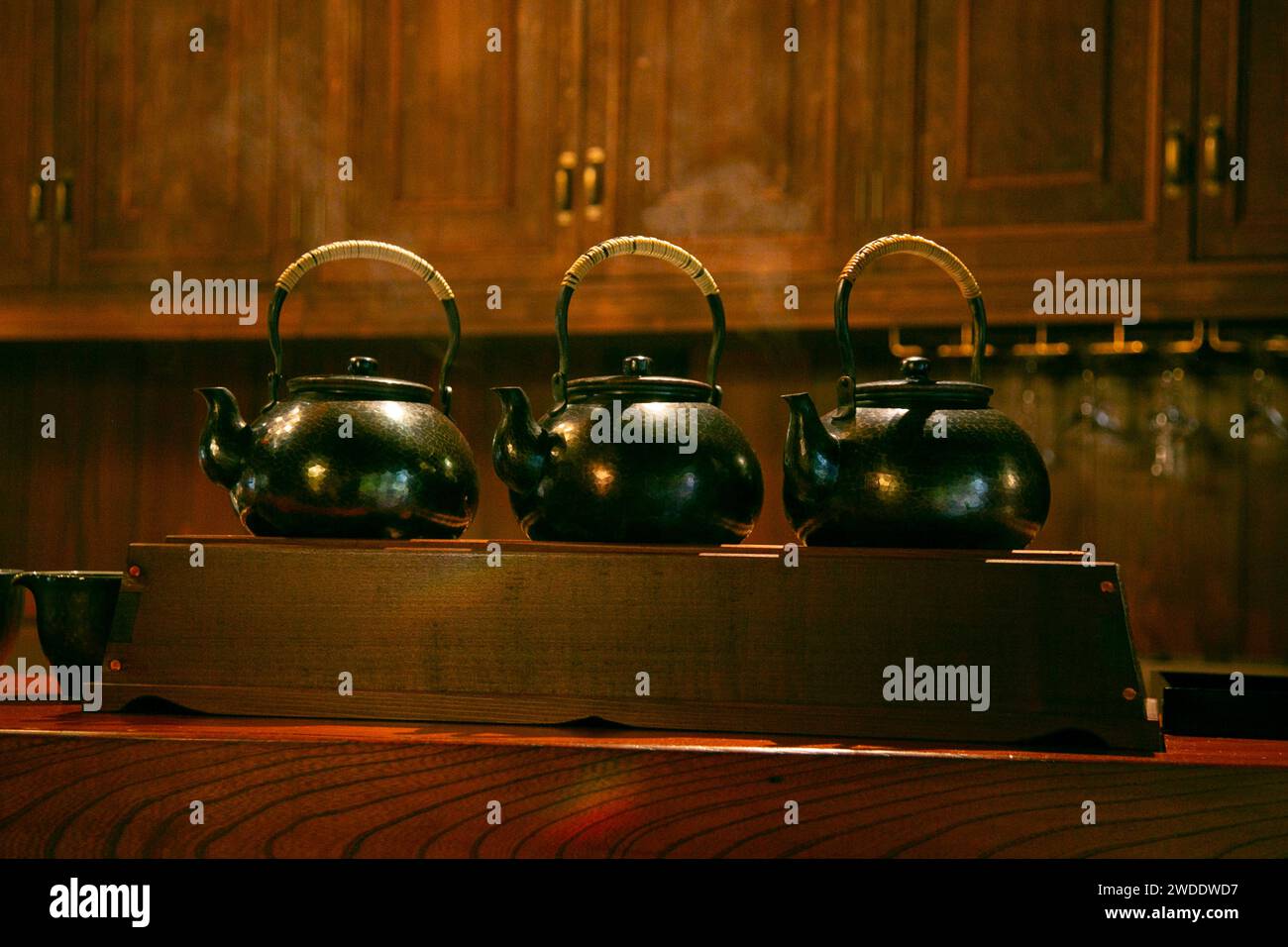 Iron tea containers in a traditional tea house in Murakami City, Japan ...