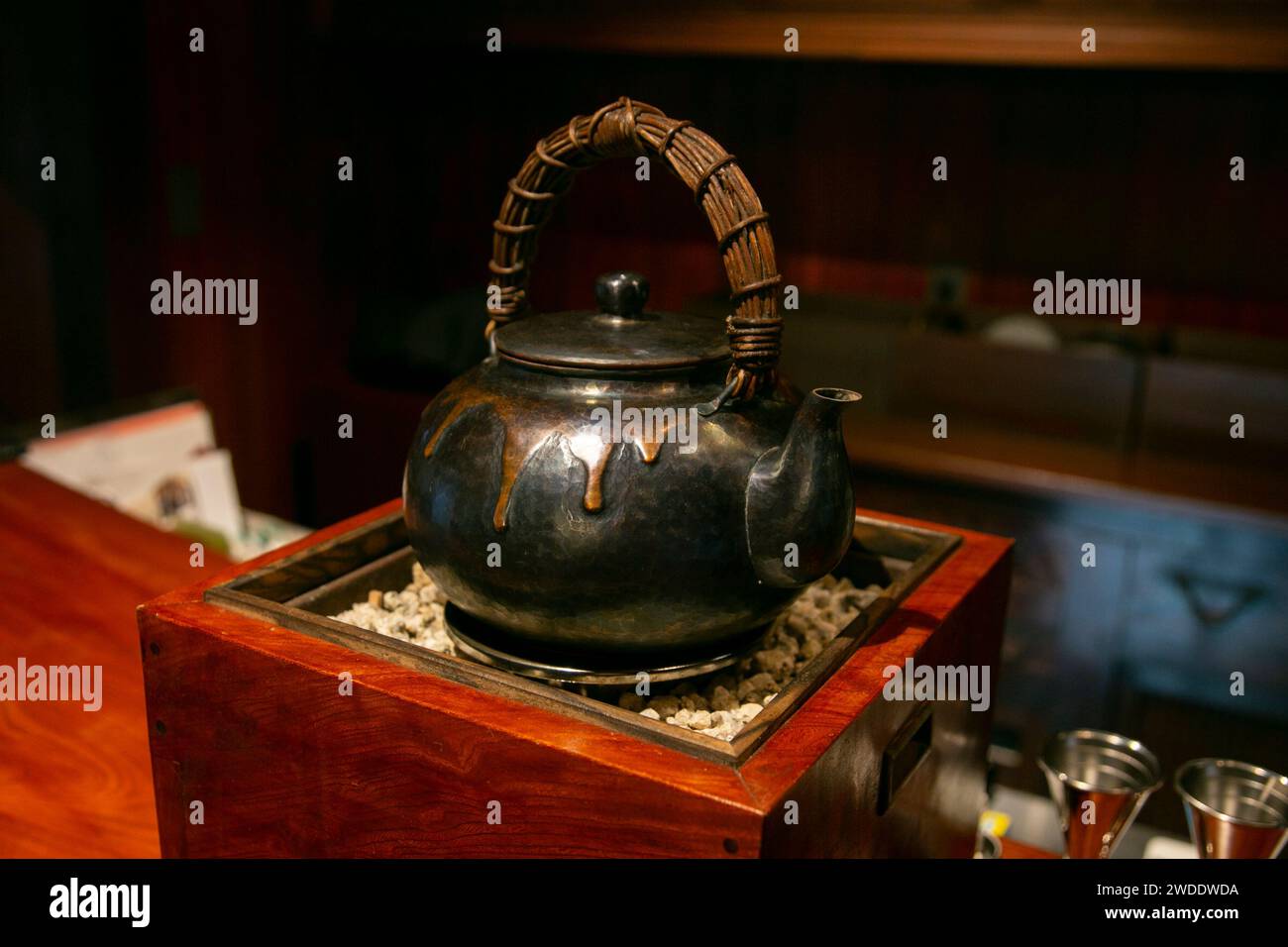 Iron tea containers in a traditional tea house in Murakami City, Japan ...