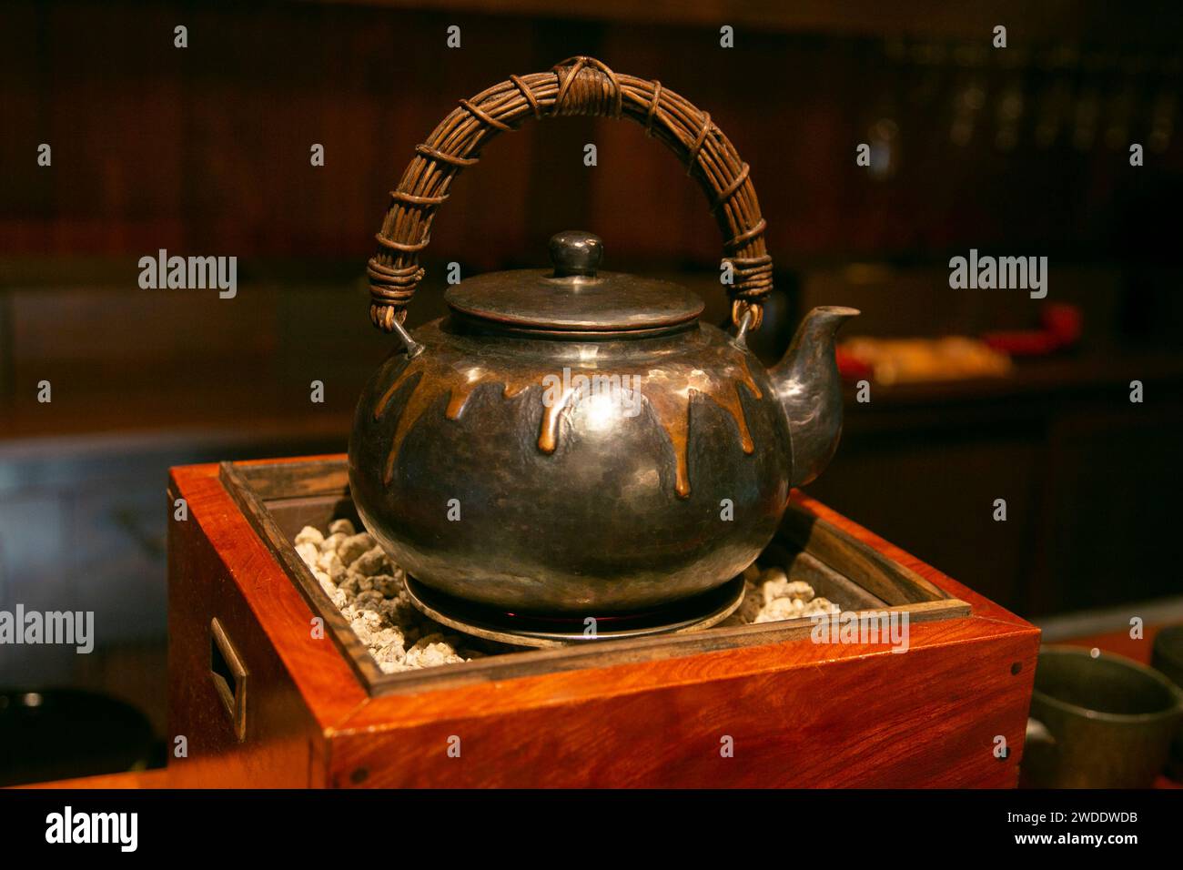 Iron tea containers in a traditional tea house in Murakami City, Japan ...