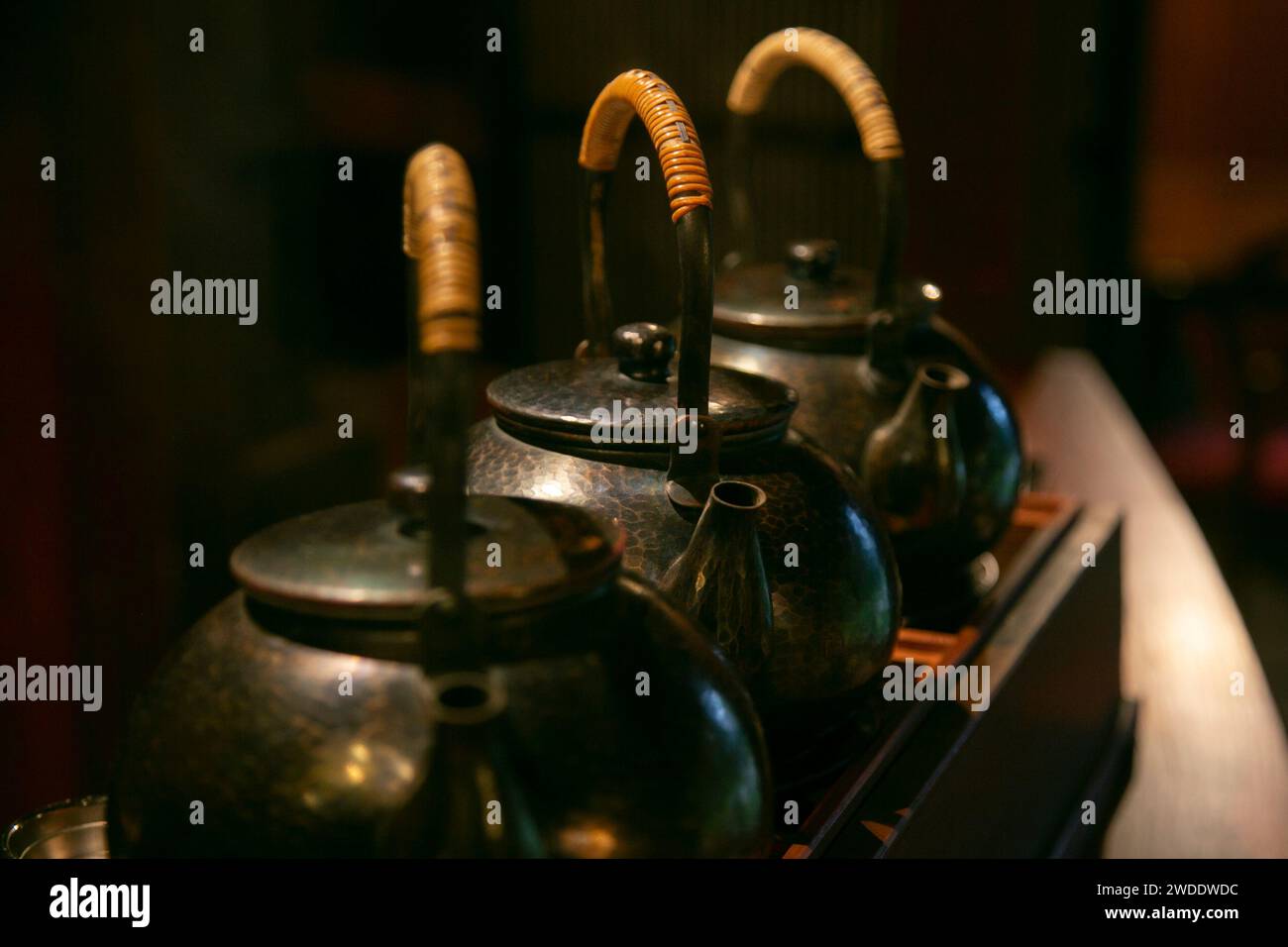 Iron tea containers in a traditional tea house in Murakami City, Japan ...