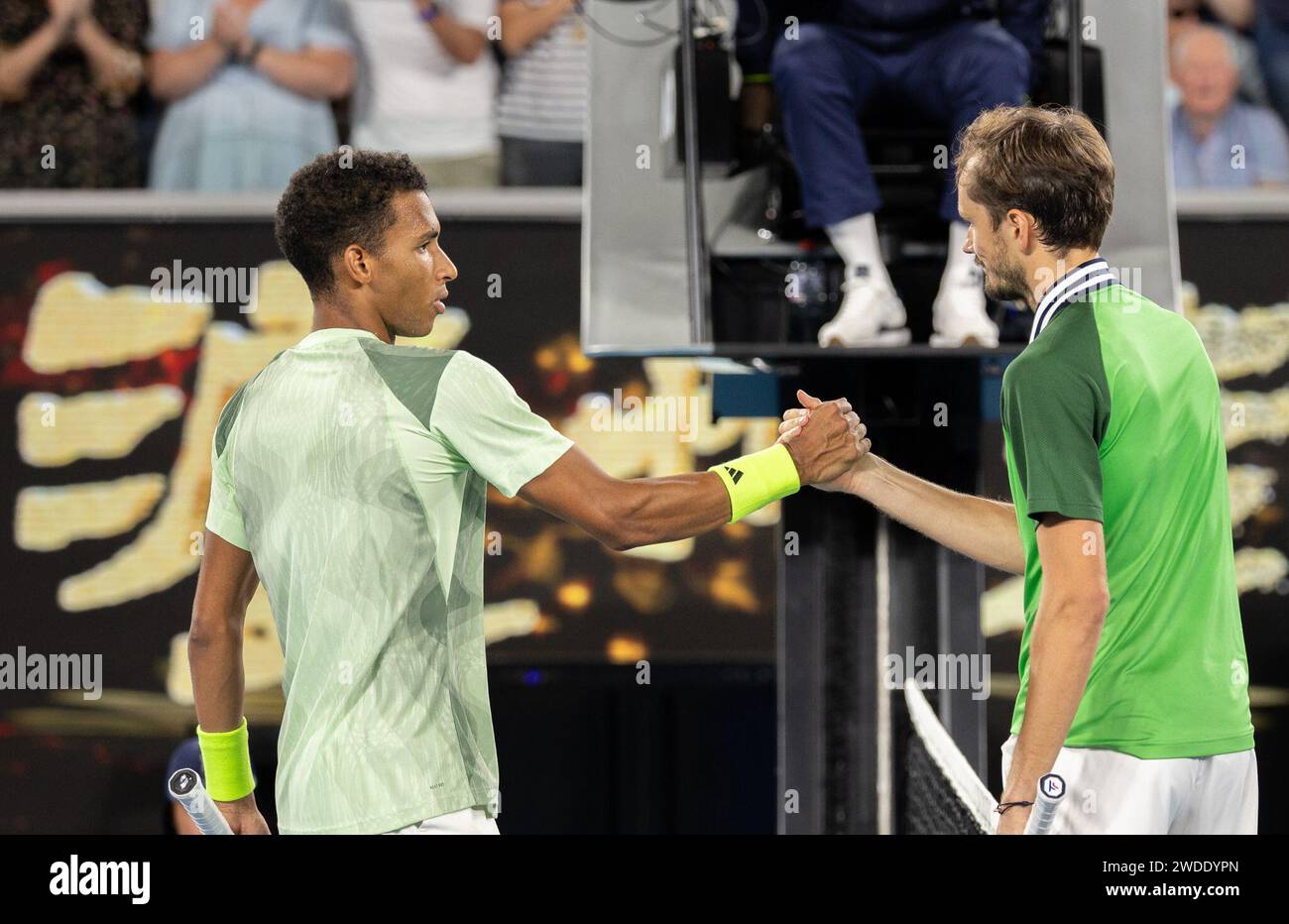 Melbourne, Australia. 20th Jan, 2024. Daniil Medvedev (R) of Russia shakes hands with Felix ...