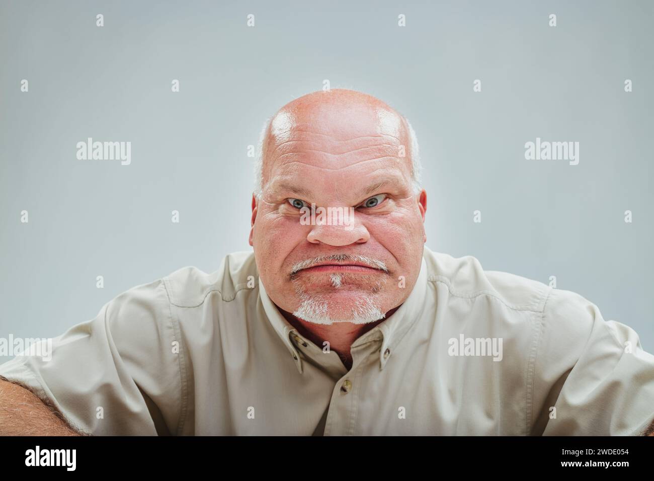 Stern faces hi-res stock photography and images - Alamy